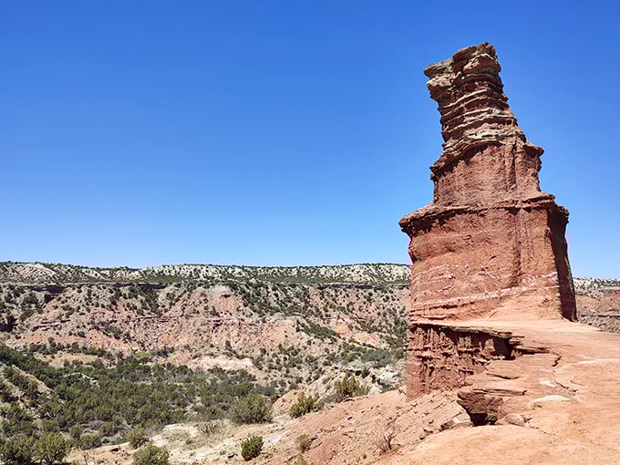 Lighthouse Rock stands tall in Palo Duro Canyon, a sentinel of red stone against the endless Texas sky.