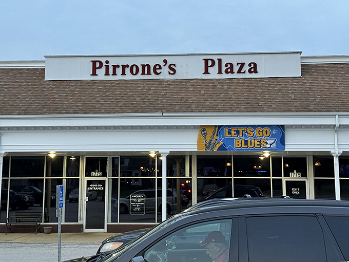 Pirrone's Plaza might look unassuming, but locals know this Florissant landmark houses St. Louis-style pizza perfection. The Blues banner says it all!