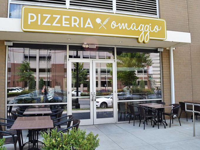 That golden sign promises authentic Italian magic, and the outdoor seating whispers "stay awhile, friend."