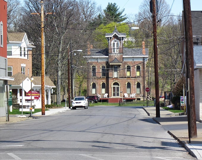 This stately brick building anchors Punxsutawney's historic district, standing tall like it's seen a century of groundhog predictions.