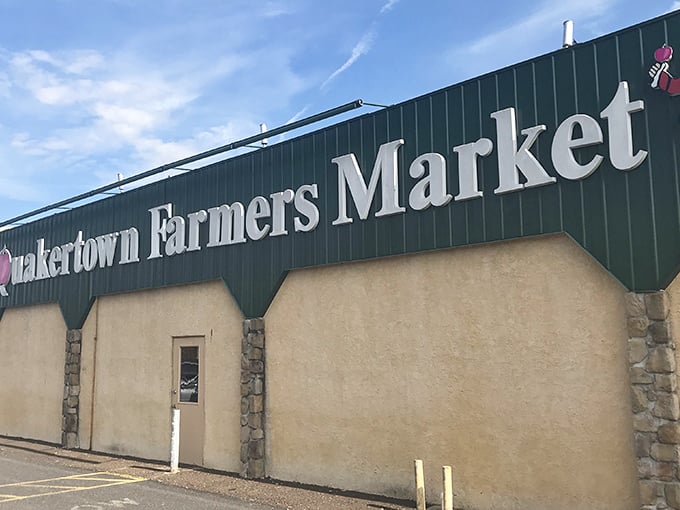 The iconic green sign welcomes you to a world where farmers and antique dealers have shared space for generations.