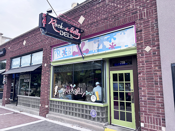 That lime green door practically winks at you, promising sandwich adventures beyond your wildest dreams.