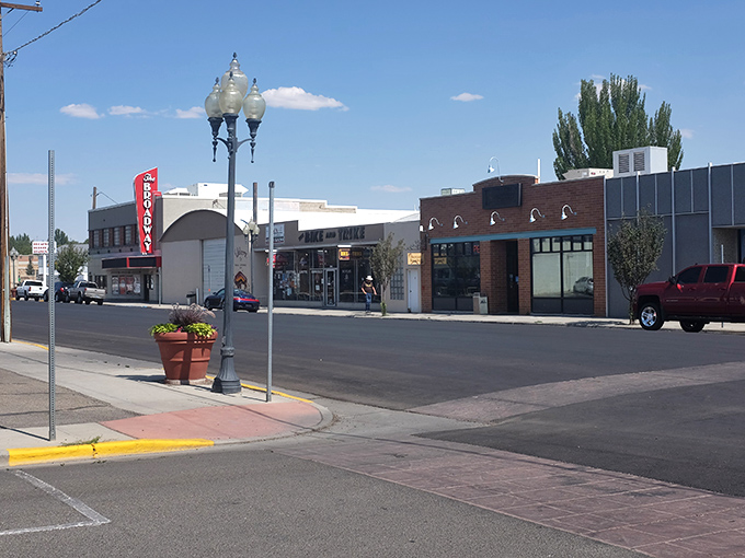 Rock Springs' downtown corridor offers that quintessential Wyoming feel. The America Theater sign stands as a beacon of affordable entertainment.