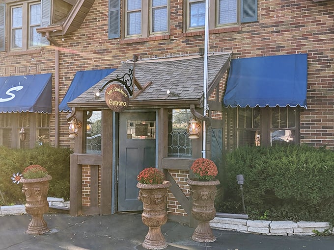 Sam's Steakhouse entrance feels like discovering a secret culinary clubhouse. Those flower pots aren't just pretty&mdash;they're the appetizer for your eyes.