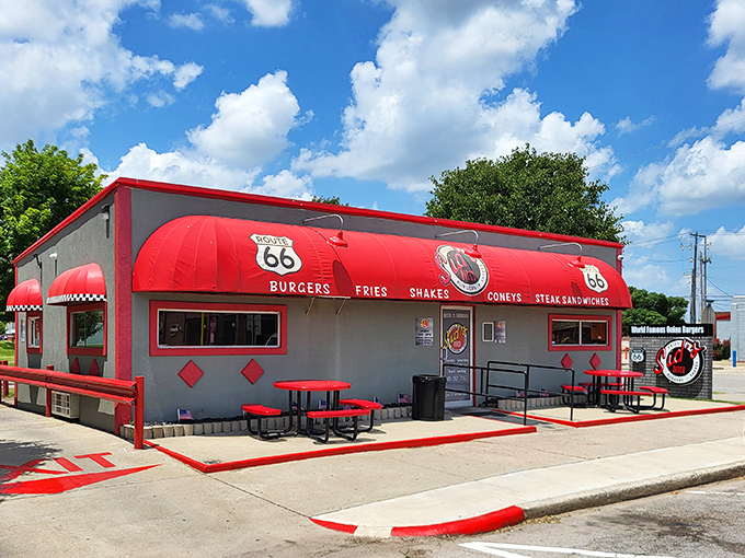 Sid's vibrant red exterior pops against the Oklahoma sky. Route 66 burgers and coneys worth a cross-country pilgrimage!