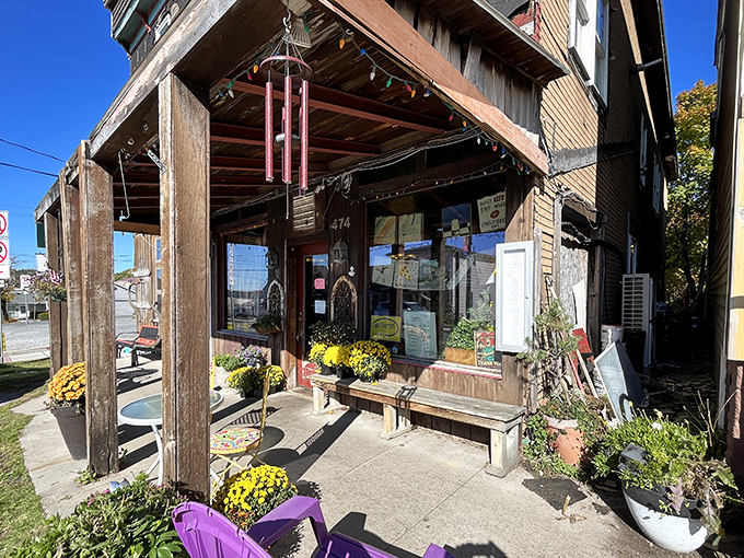 Sirianni's rustic charm looks like it was plucked straight from a storybook. Those yellow mums add a cheerful welcome!