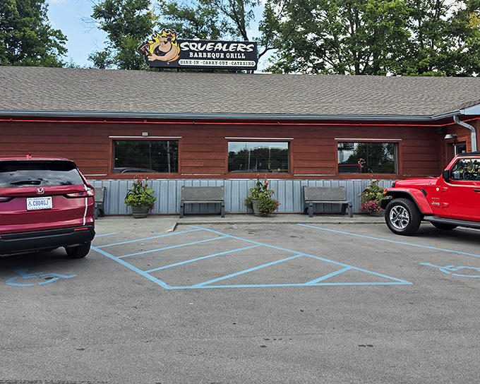 Squealers' cheerful pig logo says it all&mdash;this place knows its pork! The rustic wooden exterior practically whispers "come get messy."