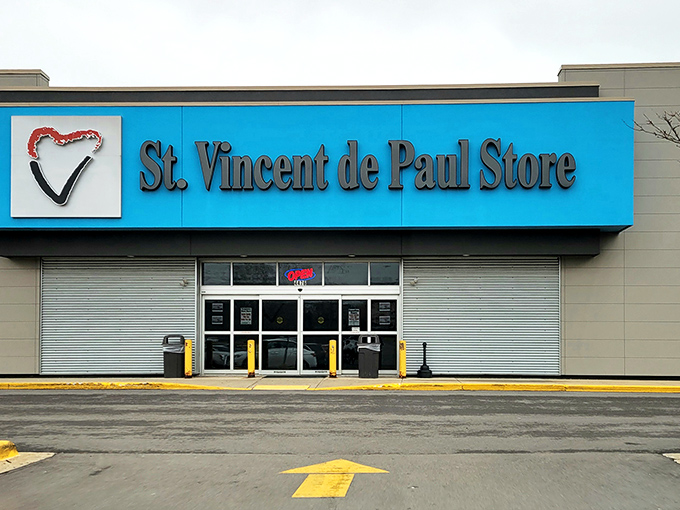 The bright blue sign of St. Vincent de Paul beckons bargain hunters like a lighthouse guiding ships to treasure-filled shores.