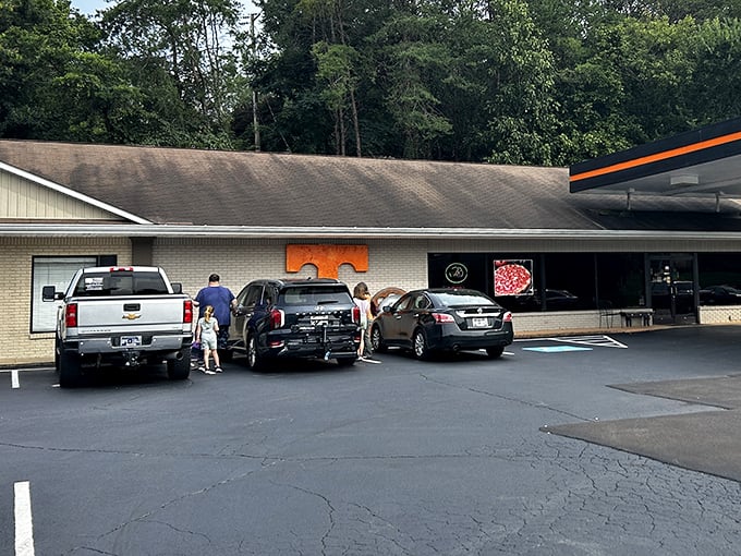 Tennessee Pizza Company's unassuming exterior hides pizza greatness within. That orange "T" is like a bat signal for your taste buds.