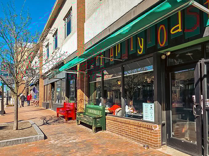 The Friendly Toast's green awning beckons like a lighthouse for hungry souls navigating Portsmouth's morning streets.