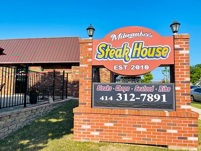 Milwaukee Steakhouse announces itself with no-nonsense confidence. That brick sign might as well say "Serious Steak Zone Ahead."