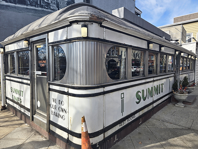 Summit Diner's vintage stainless steel dining car whispers stories of countless morning conversations over steaming coffee cups.