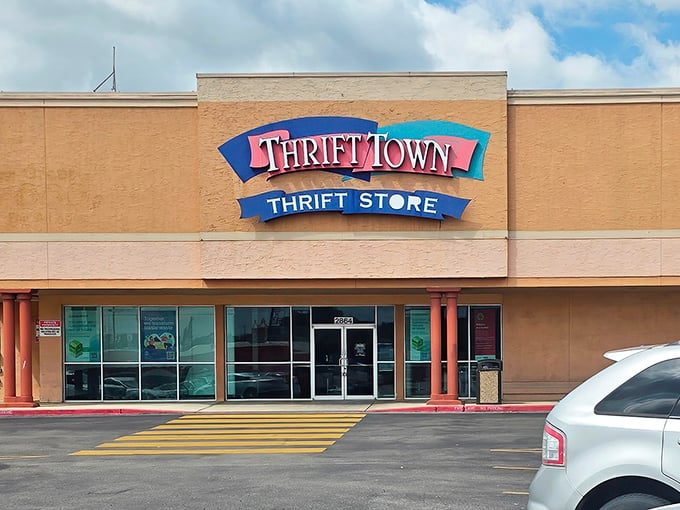 Thrift Town's cheerful sign promises adventure. Like a theme park where the rides are racks of potential new outfits!