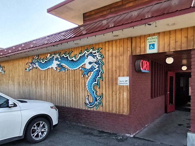 That stunning blue dragon mural makes this spot impossible to miss, like a mythical guardian watching over delicious Mongolian BBQ treasures.