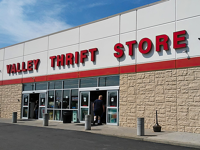 Valley Thrift's bold red sign promises treasures within. Like a department store where everything has a story.