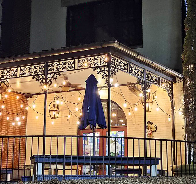 Twinkling lights and elegant ironwork create the perfect setting for Vecchia's authentic Neapolitan magic.