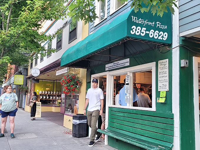 Waterfront Pizza's humble green storefront hides Port Townsend's worst-kept secret. The line forms for a reason, folks!