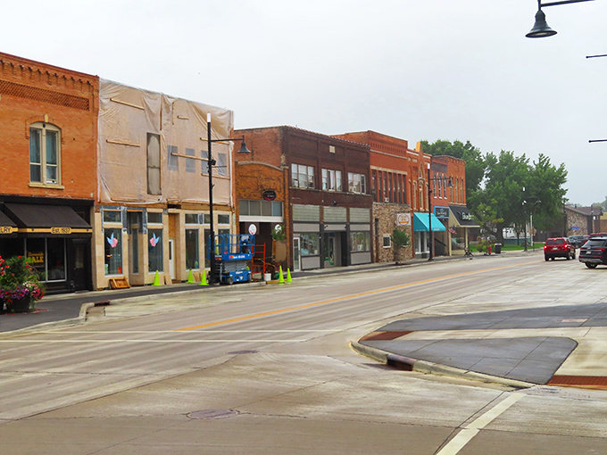 Where historic buildings stand shoulder to shoulder like old friends catching up. You can almost hear the bricks whispering stories from another century.