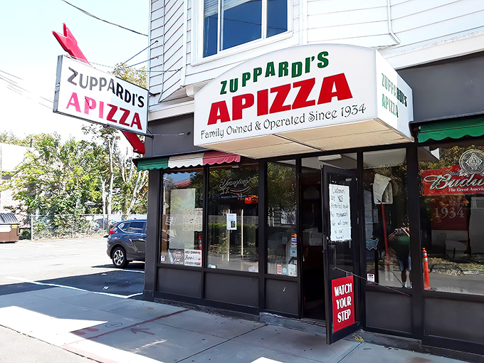 Zuppardi's iconic sign has guided hungry pizza pilgrims since 1934. That "Family Owned" promise means recipes passed down with love through generations.