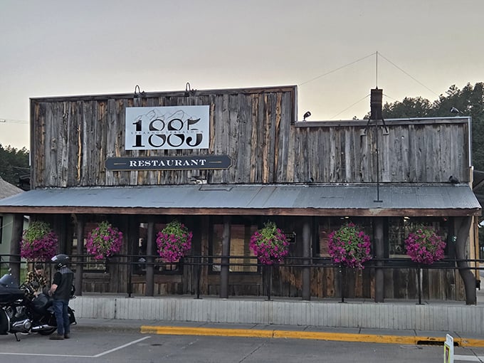 Those hanging flower baskets aren't just pretty&mdash;they're saying "Come inside where the steaks are as colorful as our history!"