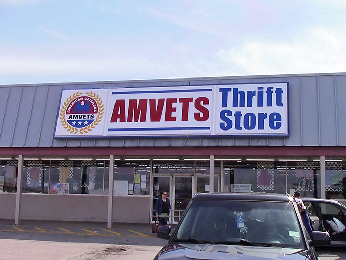 Where eagles and bargains soar together! AMVETS' bold signage beckons thrifty patriots to hunt for treasures while supporting those who served.