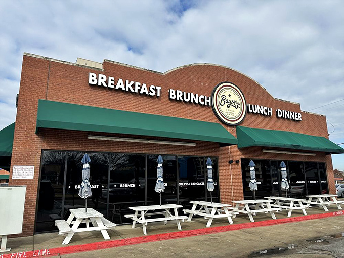 Morning sunshine and picnic tables outside Bay34th Street Diner. The kind of place where "breakfast, brunch, lunch, dinner" isn't a menu – it's a lifestyle choice.