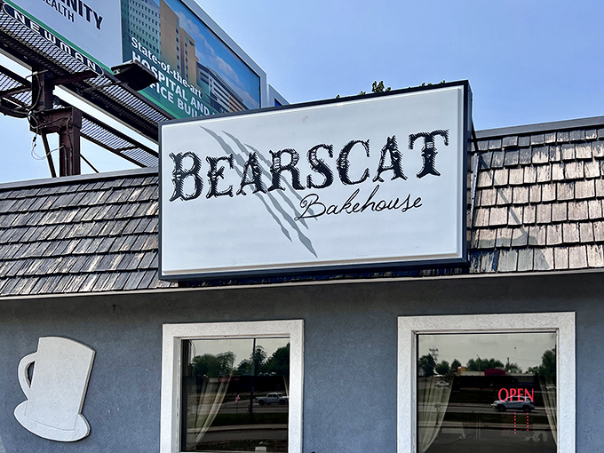 Bearscat Bakehouse's distinctive sign and claw mark logo invite donut lovers to discover the sweet treasures waiting inside.
