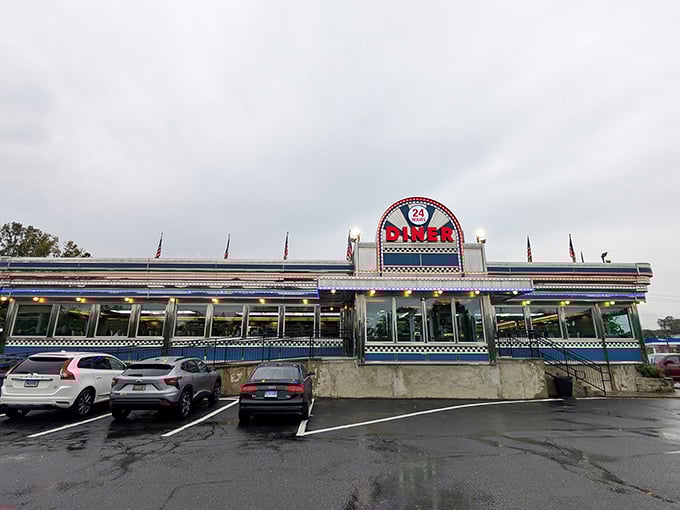 When the clouds gather but the Blue Colony's lights are always on. This chrome cathedral of comfort food has witnessed first dates, family celebrations, and late-night confessions.