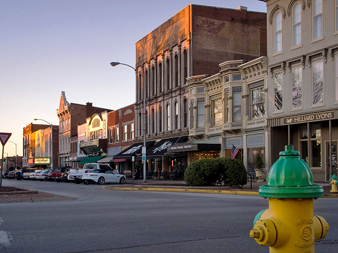 The golden sunset bathes Bowling Green's downtown in warm light, much like the warm feeling of affordable living.