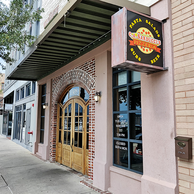 That sign beckons like an old friend: "Pasta, Salads, Subs, Beer." CA Sarducci's knows four essential food groups!