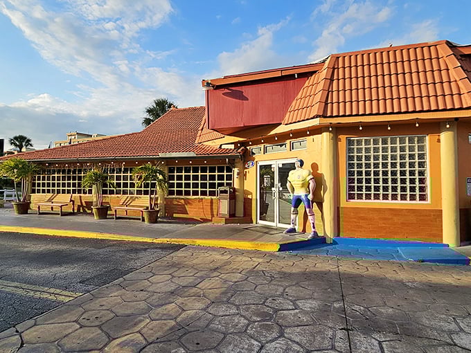 The terra cotta roof and sunny yellow walls of Cafe Mineiro might as well be saying "Come in, loosen your belt, prepare for meat sweats."