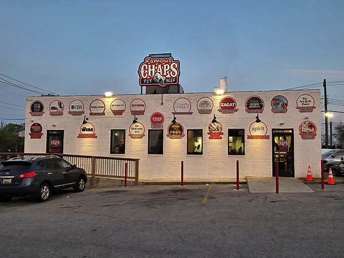When night falls, Chaps' glowing facade becomes a lighthouse guiding BBQ pilgrims to beefy bliss.