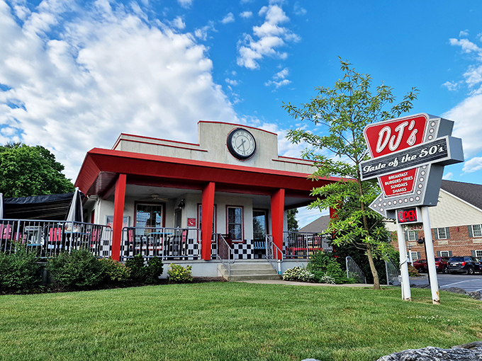 Blue skies frame this red-trimmed slice of nostalgia. DJ's isn't just a diner; it's a portal to simpler times.