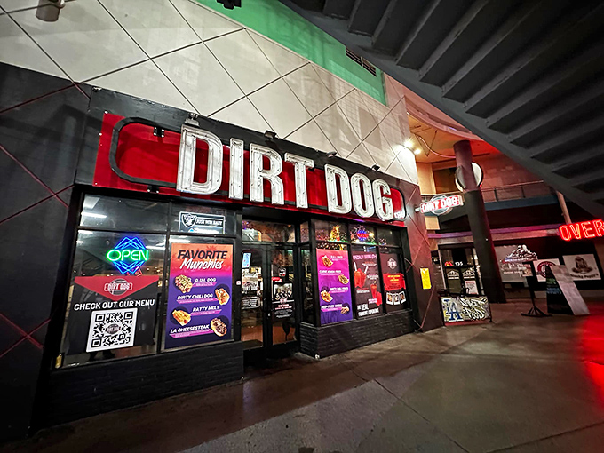 Late night cravings meet their match at Dirt Dog, where the glow of red lights promises bacon-wrapped delights worth staying up for.