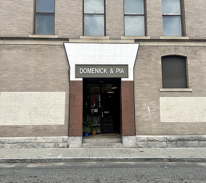 The brick building housing Domenick & Pia hasn't changed much over decades. Why mess with perfection when your pizza already has a cult following?