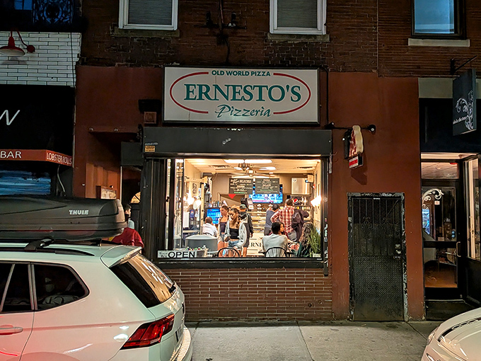 Night or day, Ernesto's glowing window offers a glimpse into pizza heaven. The line forms to the right!