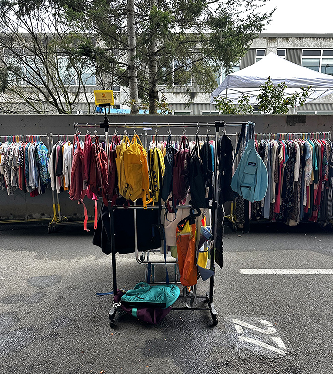 Vintage clothing racks create a colorful maze perfect for fashion treasure hunters and bargain seekers.