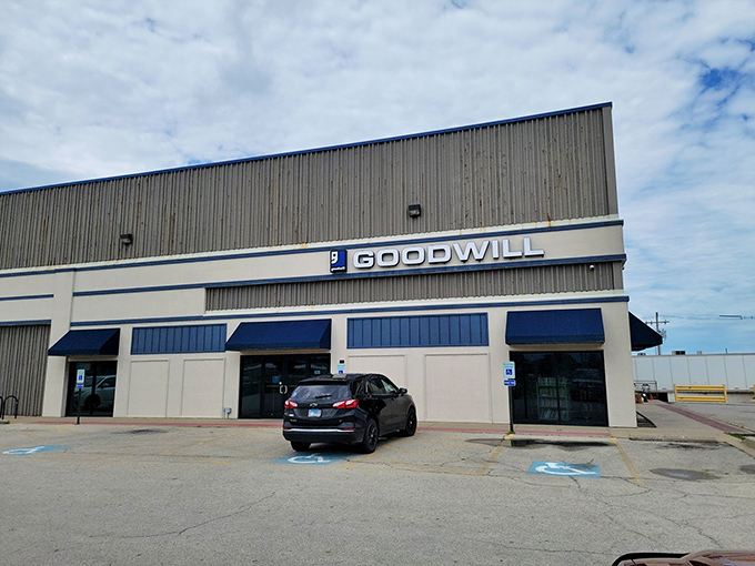 Blue skies and blue signage &ndash; Goodwill Champaign stands ready for your thrifting adventure on a perfect Illinois day.