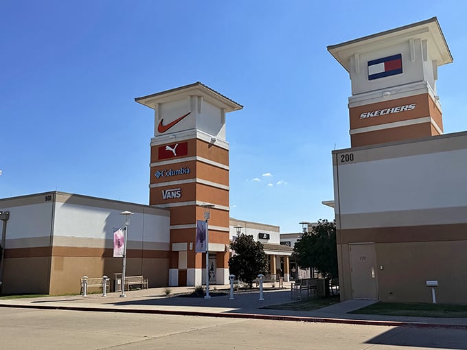 Brand towers standing tall like retail sentinels, promising treasures within at prices that won't make you wince.