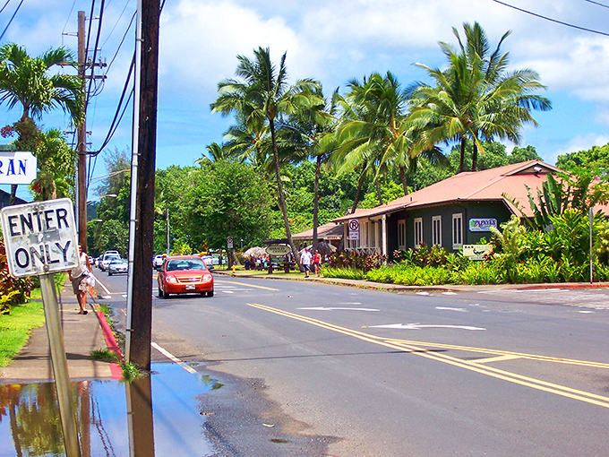 Small-town charm meets island magic in Hanalei, where local shops nestle beneath dramatic mountains.
