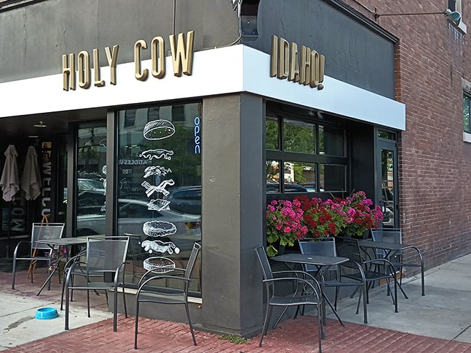 Corner spot perfection! Holy Cow's outdoor seating invites you to enjoy Idaho sunshine along with chicken that's worth crossing the street for.