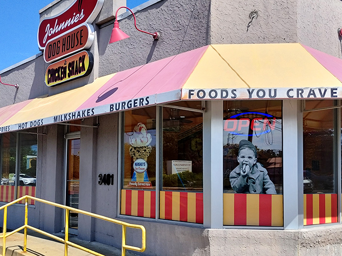 Those red and yellow stripes scream classic American diner vibes – where comfort food meets genuine neighborhood warmth.