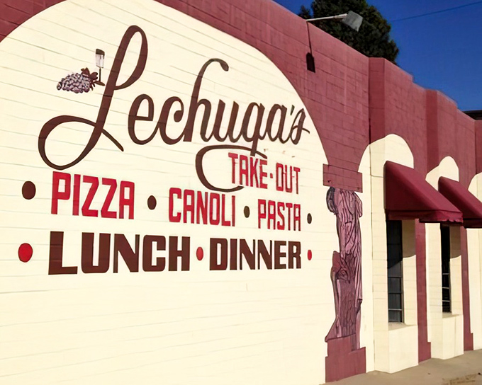 That pink-and-white painted exterior isn't just a restaurant – it's a Denver landmark where memories are made one slice at a time.