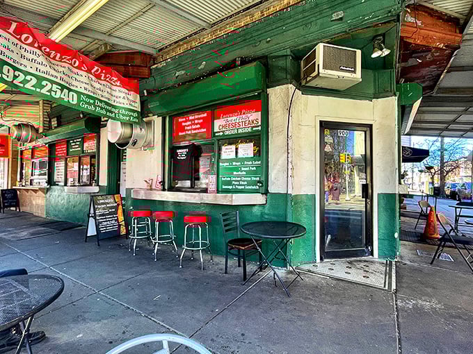 Grab a seat outside Lorenzo's for a classic Philly cheesesteak or a slice of their famous pizza. Great street food!