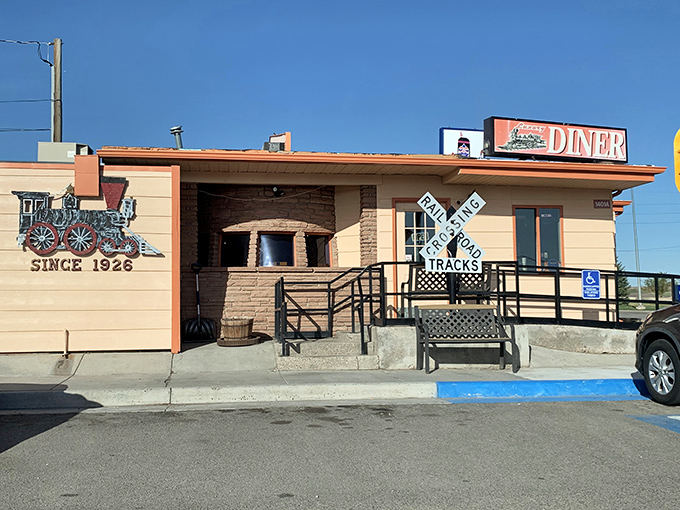 This trackside treasure proves the best diners often sit right where life intersects perfectly. 