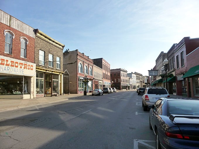 Manistee's River Street showcases a parade of historic storefronts where "Electric Hardware" still means personal service, not online shopping.