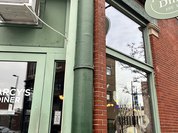 The mint-green trim frames windows that have witnessed decades of Portland's best breakfast conversations and coffee refills.