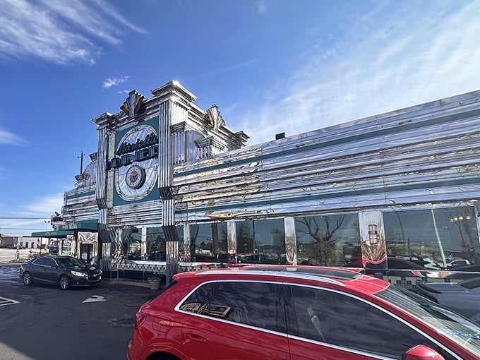 This silver palace of pancakes stands proudly against the Georgia sky, a beacon for hungry travelers day and night.