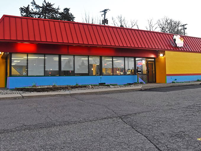 The sunset glow on Mr. Donuts' fa&ccedil;ade &ndash; a beacon of hope for early risers and sweet tooth enthusiasts alike.