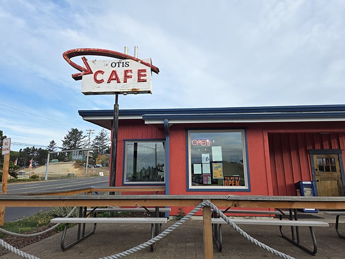 Bright blue skies frame this humble red diner, where magic happens in a space smaller than most living rooms.